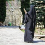 When the nun stretched out her hand, he spat in it jeeringly ...